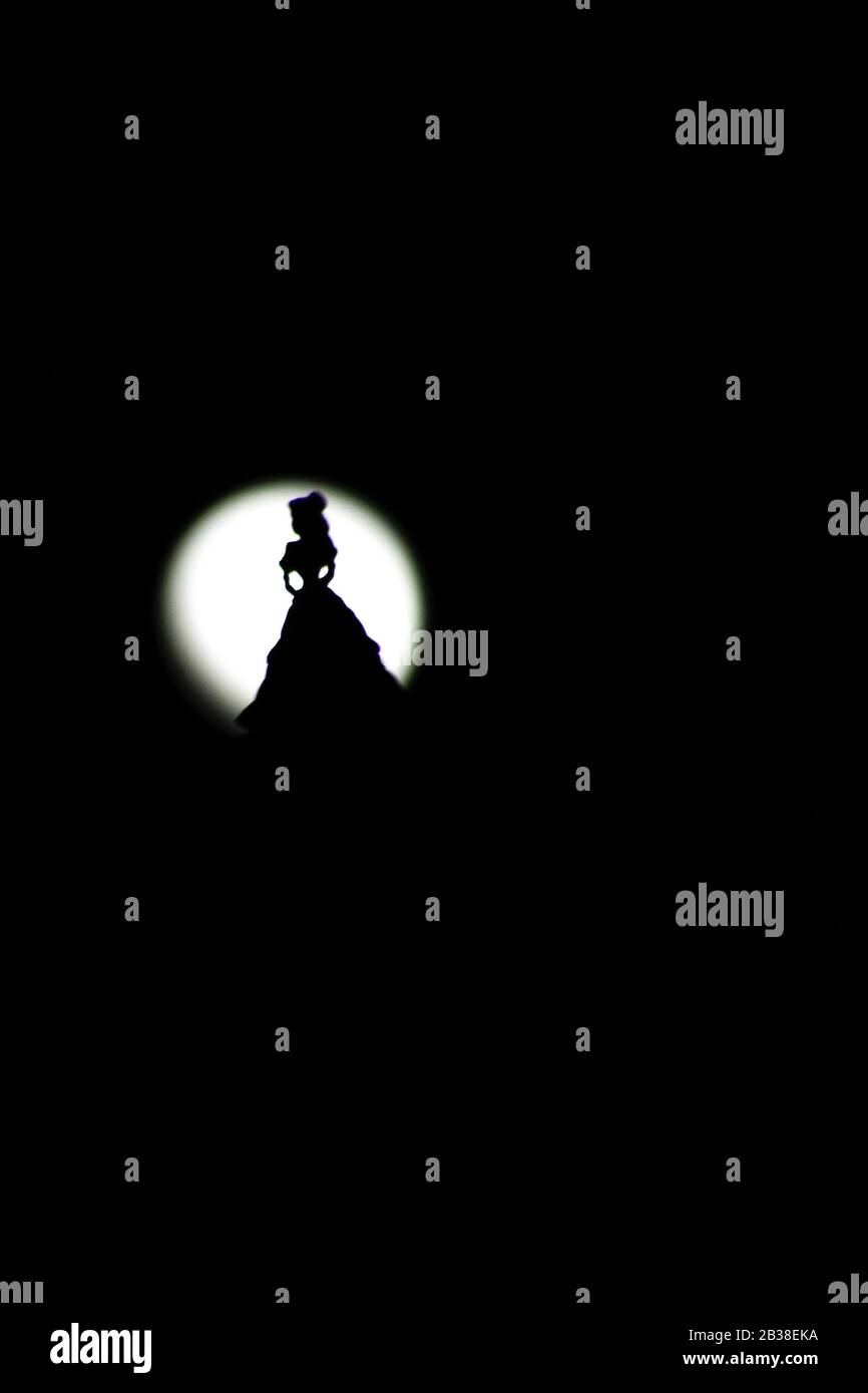 princess silhouette with a moon in dark might Stock Photo - Alamy