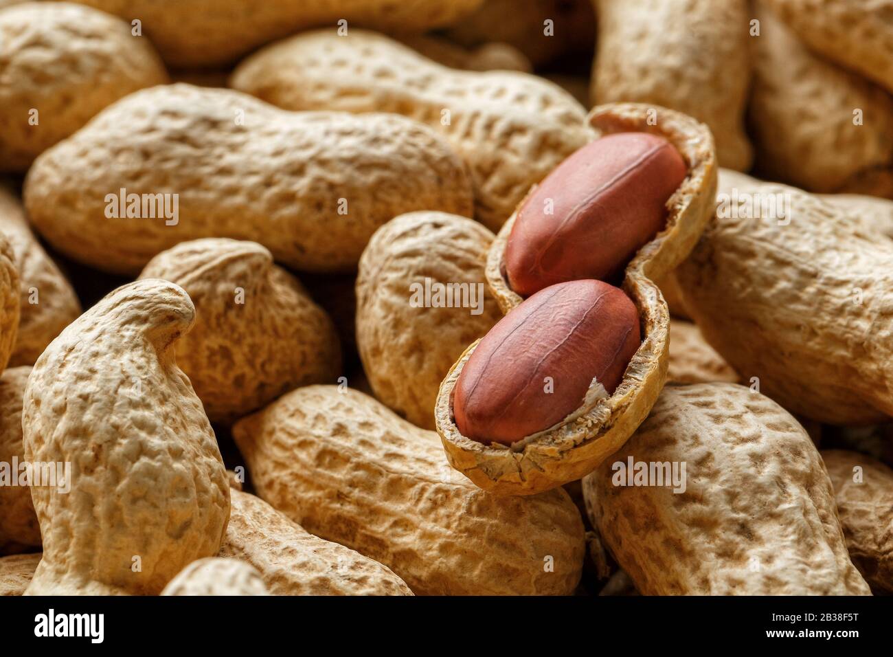 Peeled peanut on well peanuts. Peanuts, for background or textures ...