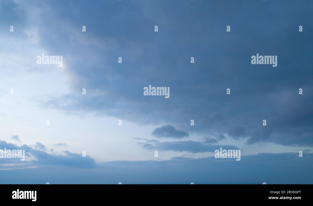 Beautiful sky with stretched clouds during twilight Stock Photo - Alamy