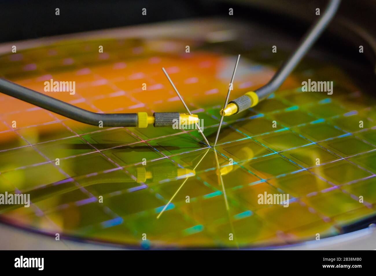 Checking microchips on silicon wafer with probe station.Microelecronics ...