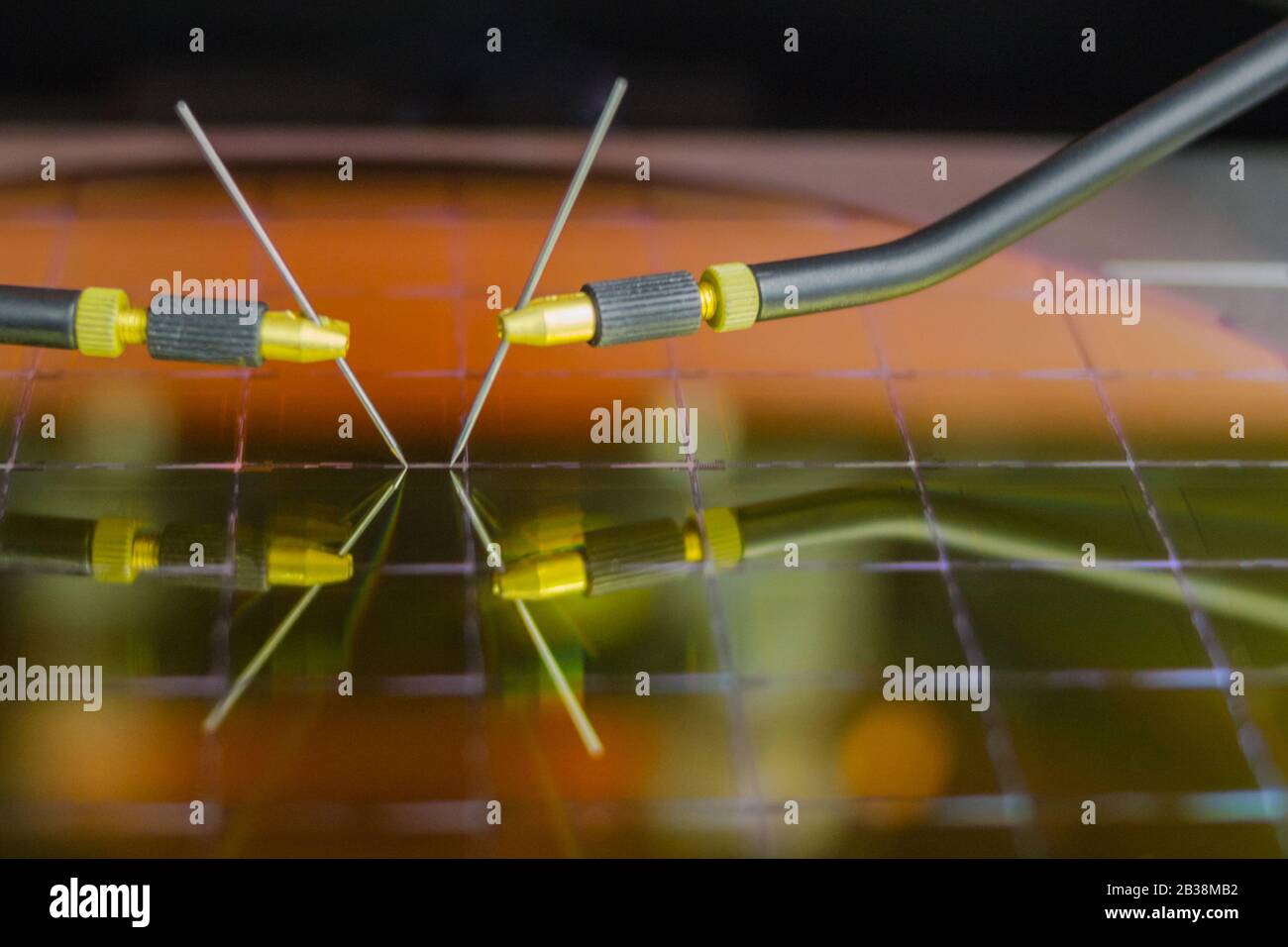 Checking microchips on silicon wafer with probe station.Microelecronics ...