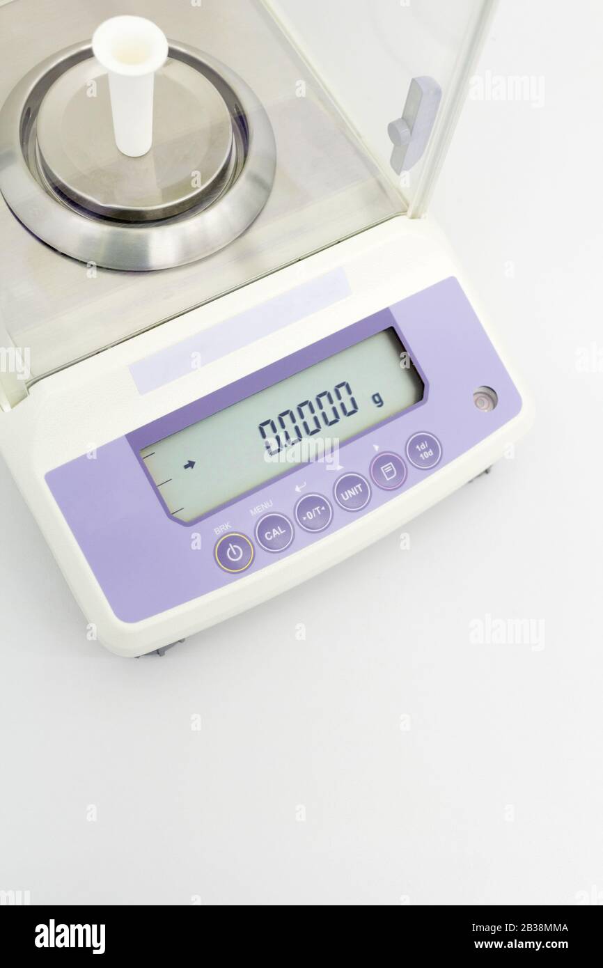 laboratory scale on table in white background Stock Photo - Alamy