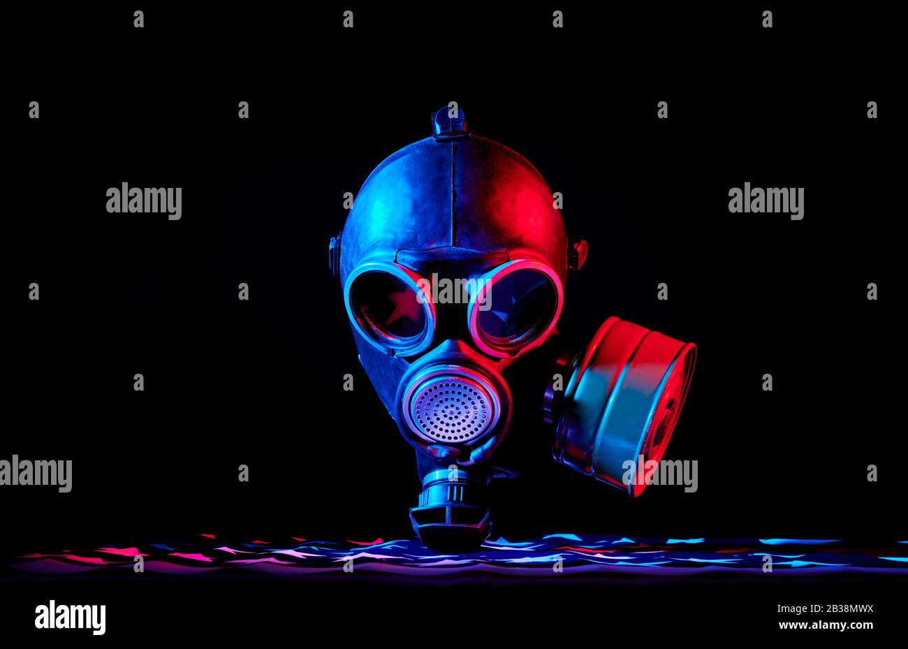 Vintage gas mask with American flag lit with red and blue lights for ...