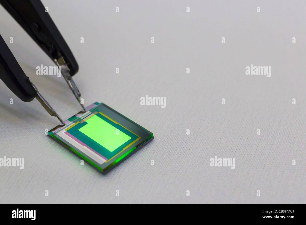 Checking turn on small oled display of green color with a probe station ...