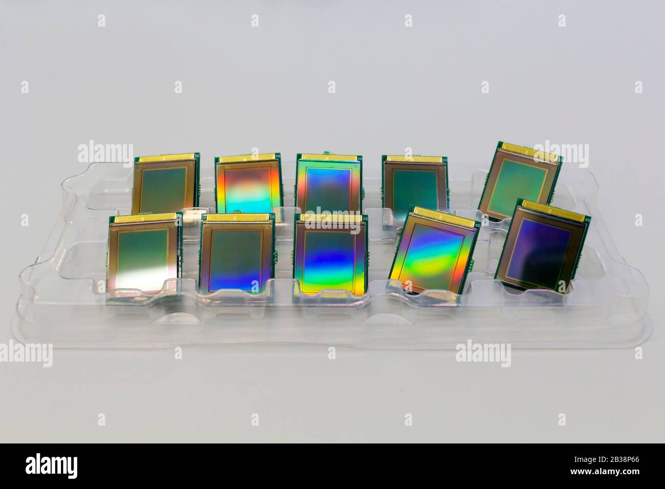 Ready-made microchips lying in a tray on the grey color surface Stock ...