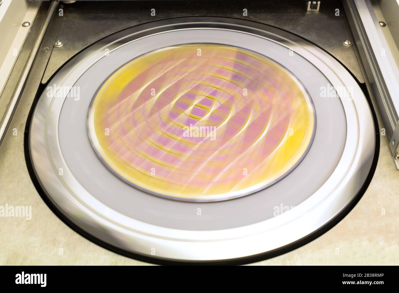 A microchip silicon wafer cleaning process that rotates at high speed ...