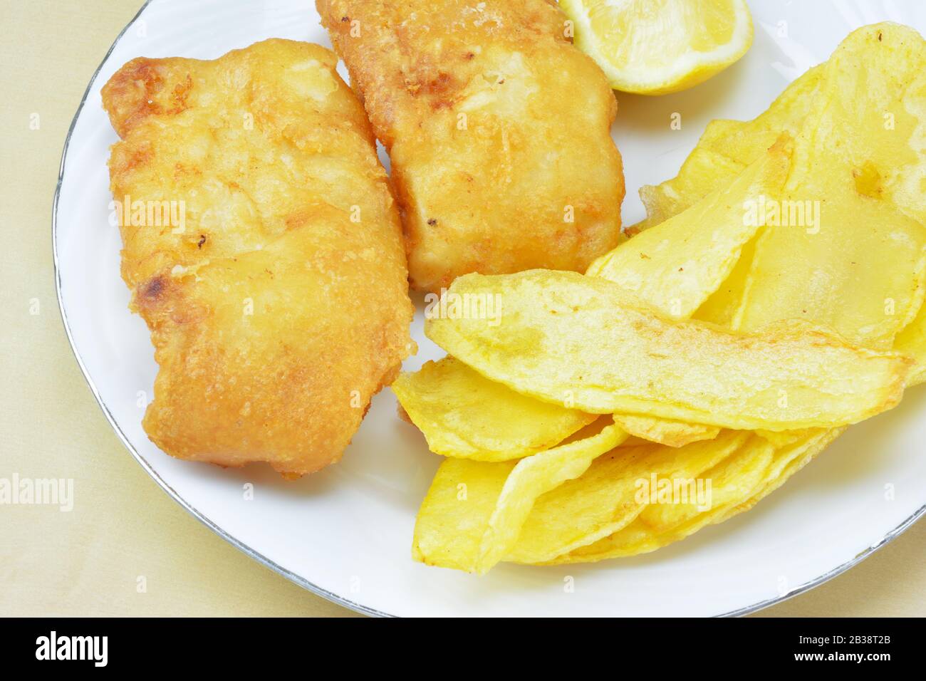 Cod fish and french fries Stock Photo - Alamy