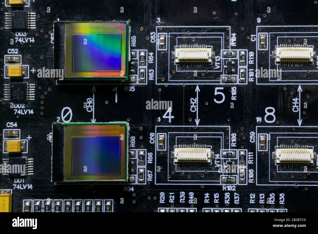 The process of checking several oled displays on the test station. The ...