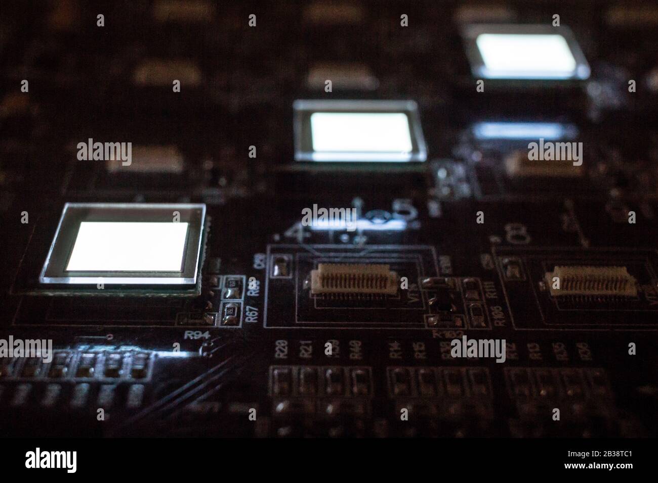 The process of checking several oled displays on the test station ...
