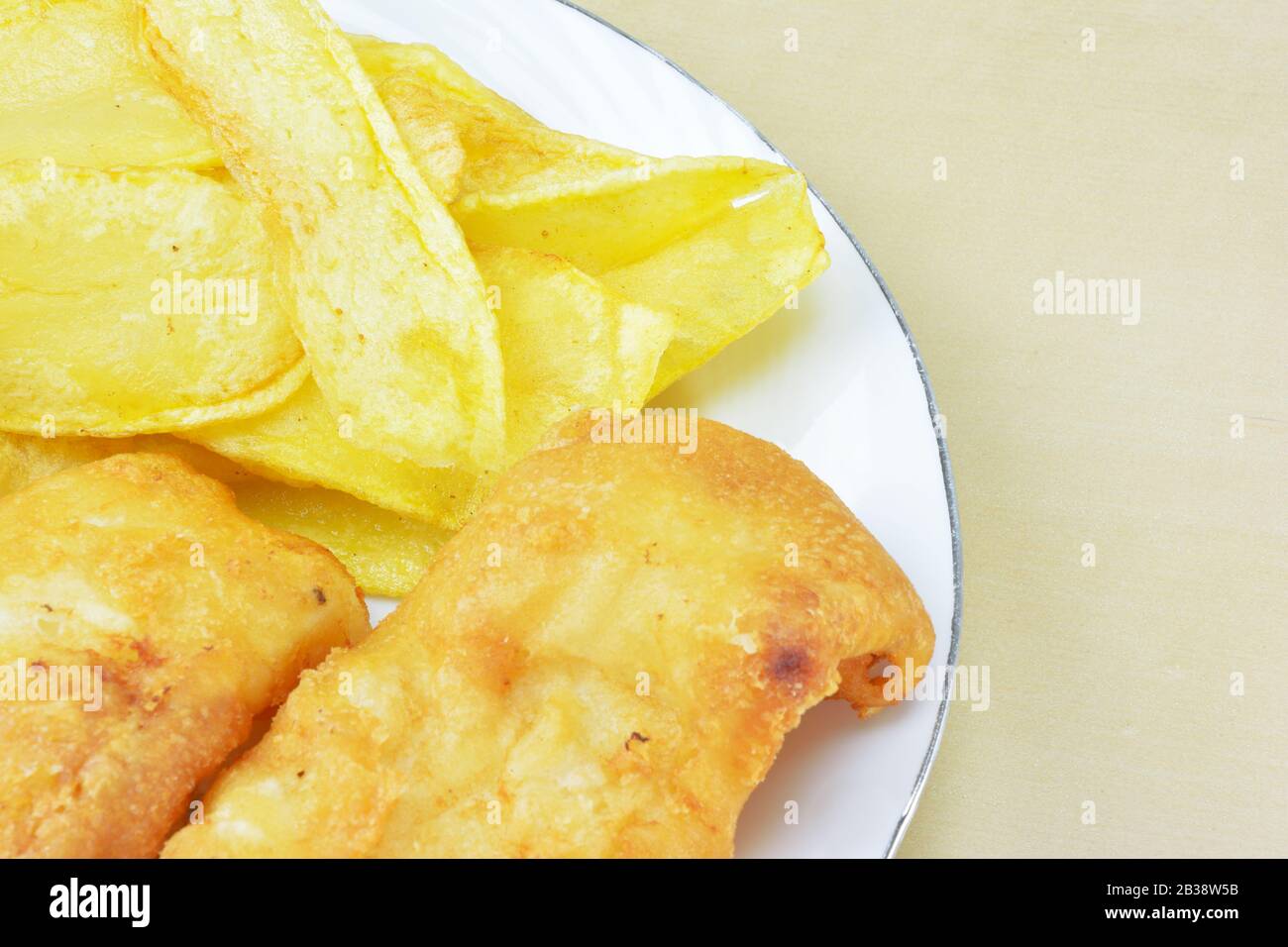 Cod fish and chips on plate Stock Photo - Alamy
