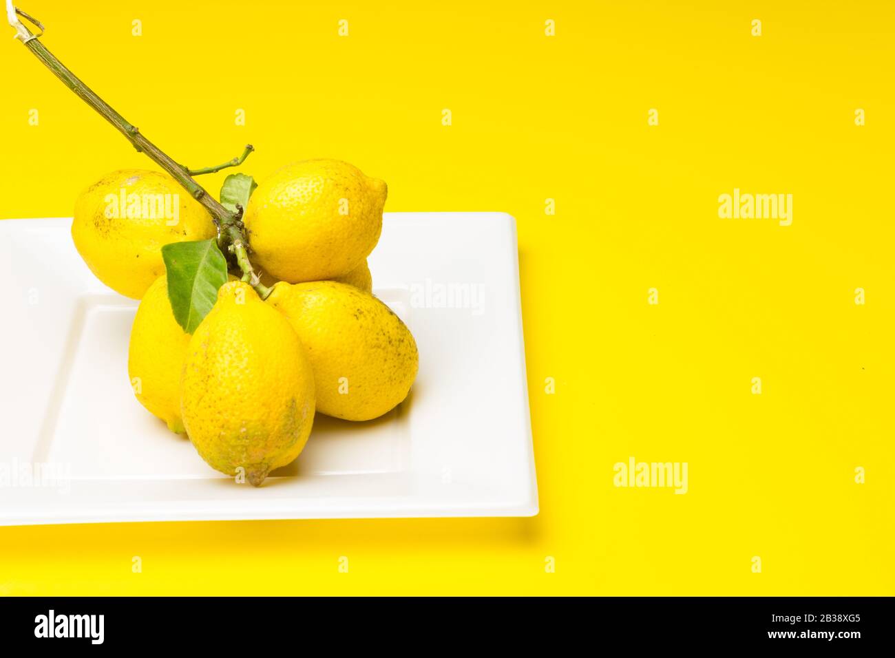 Lemon is a citrus fruit with yellow skin, with an acidic flavor from ...