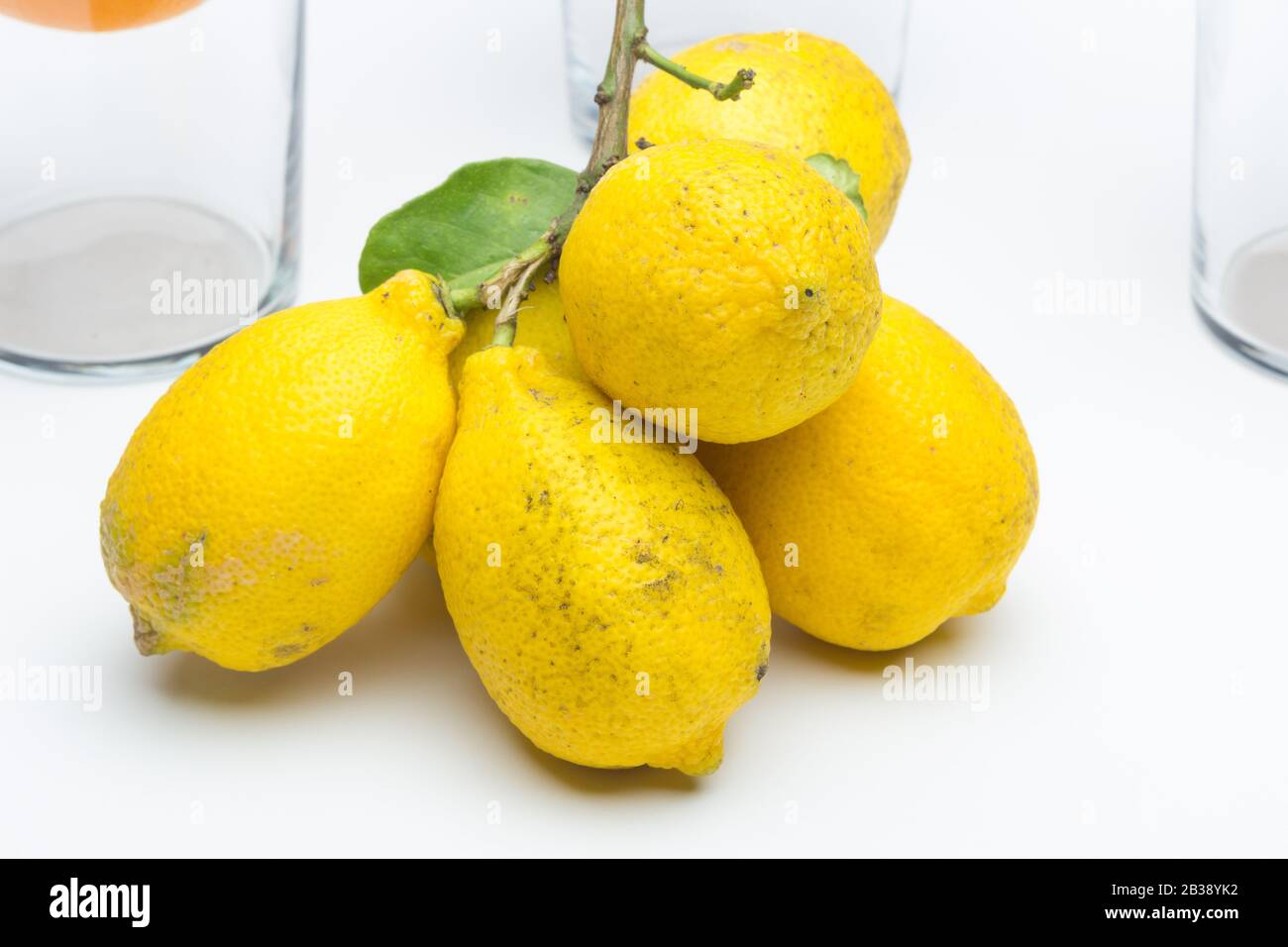 Lemon is a citrus fruit with yellow skin, with an acidic flavor from ...