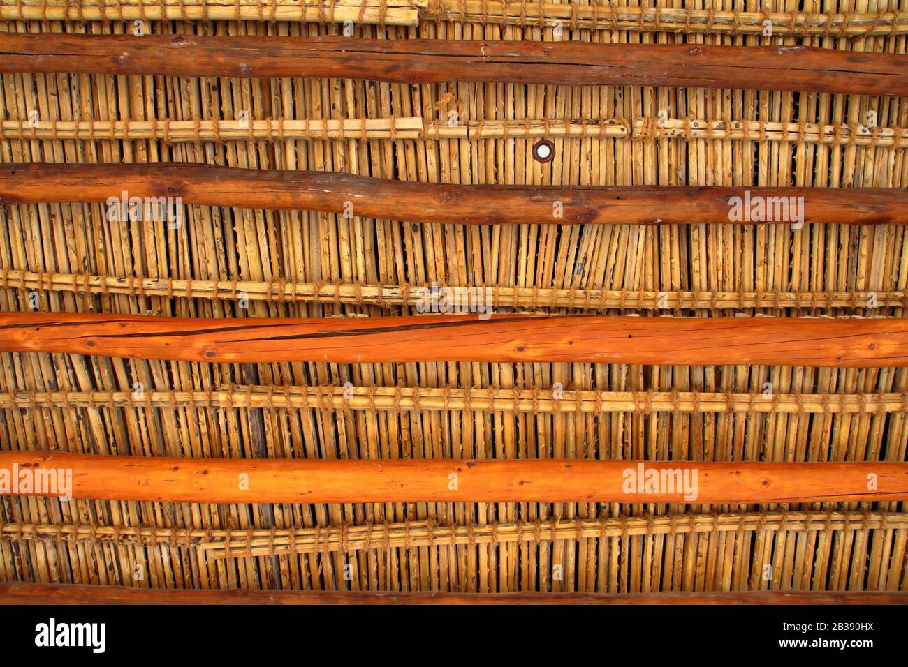Wooden ceiling with woven straw Stock Photo - Alamy