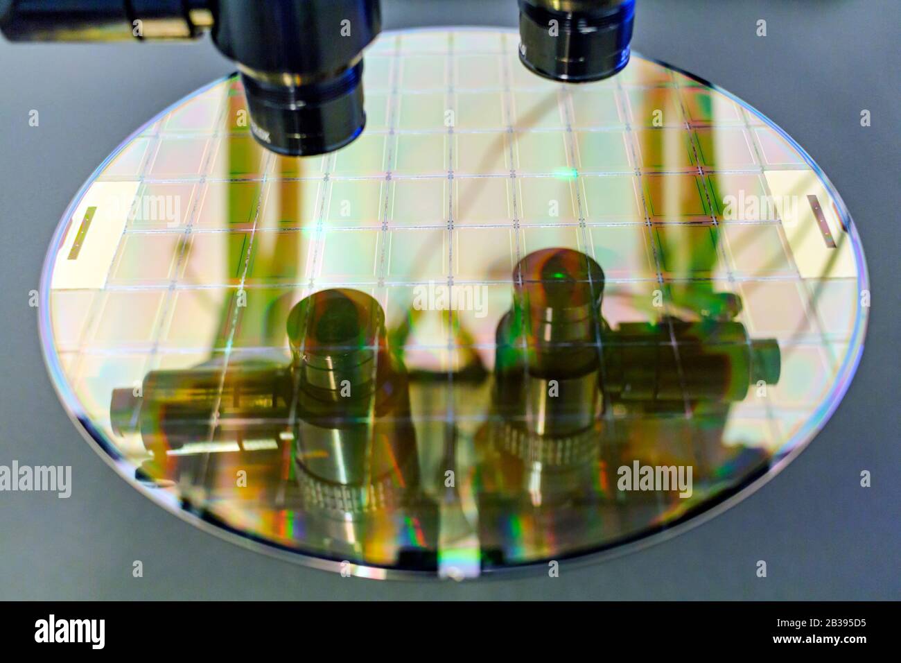 Silicon wafer on machine process examining in microscope Stock Photo ...