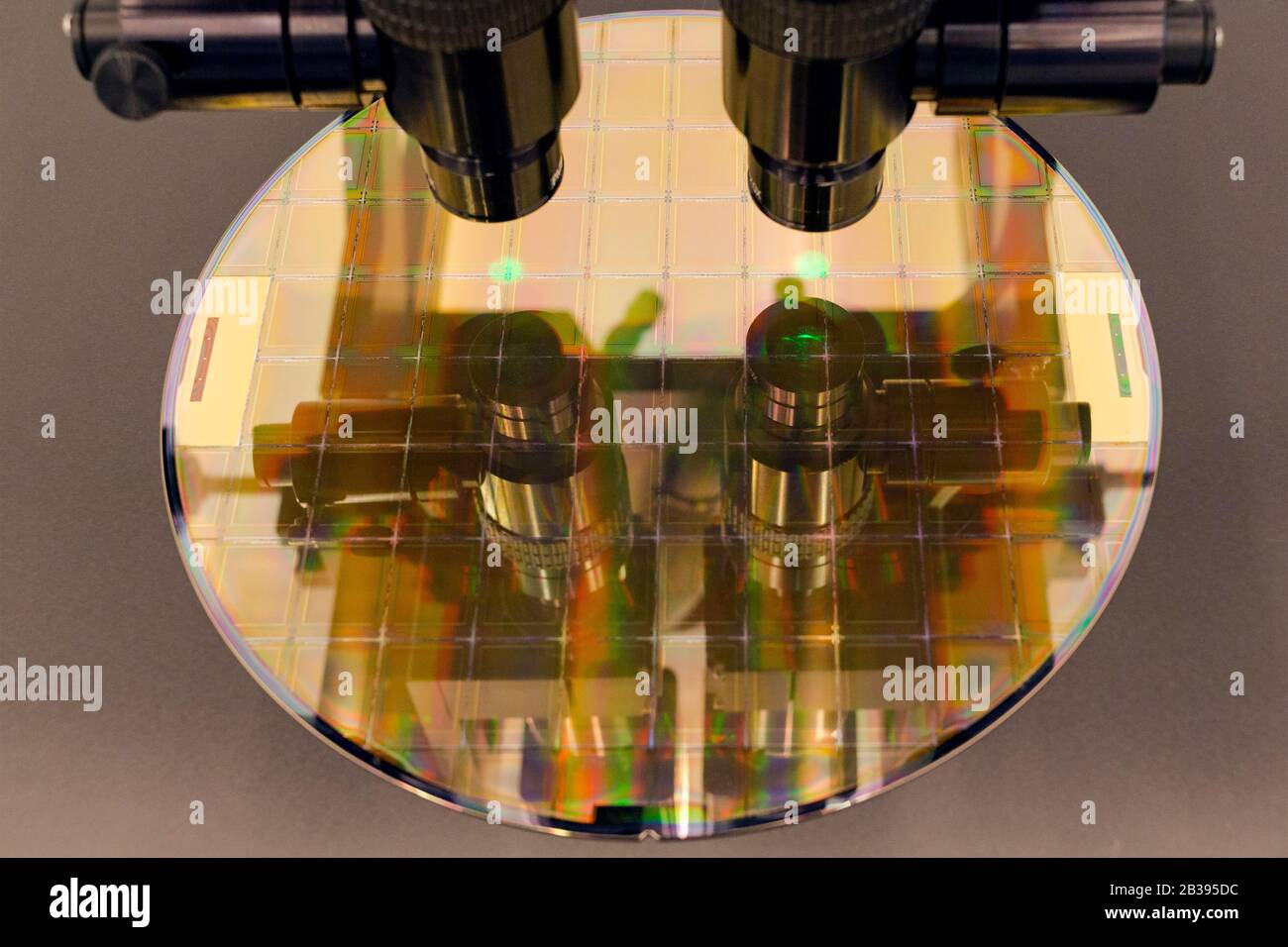 Silicon wafer on machine process examining in microscope Stock Photo ...