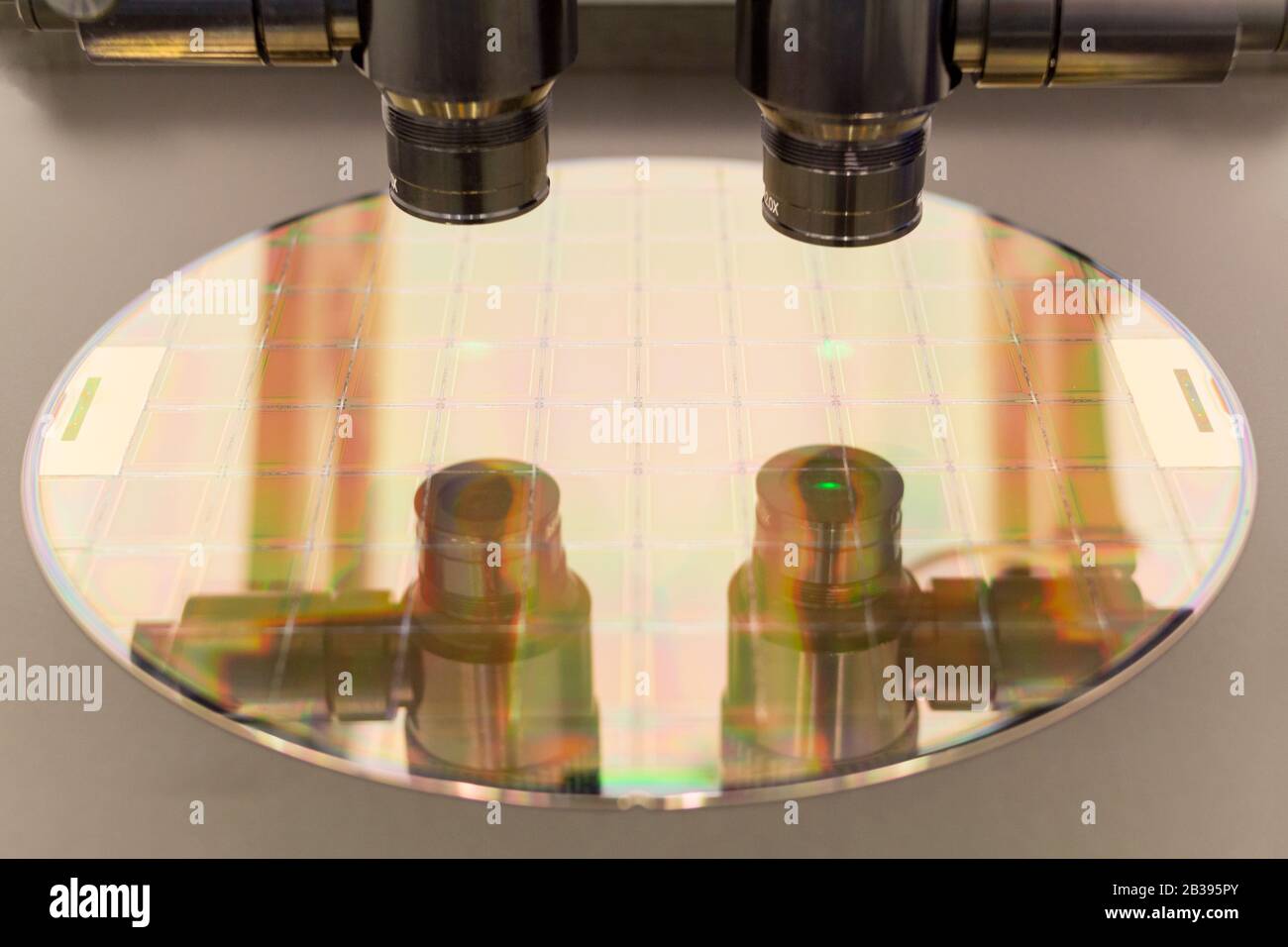 Silicon wafer on machine process examining in microscope Stock Photo ...