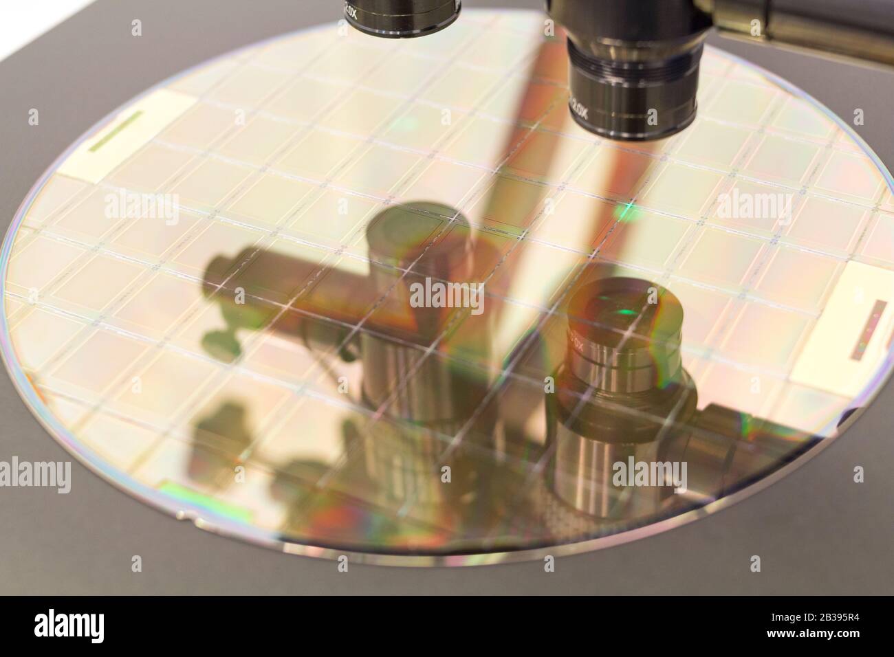 Silicon wafer on machine process examining in microscope Stock Photo ...