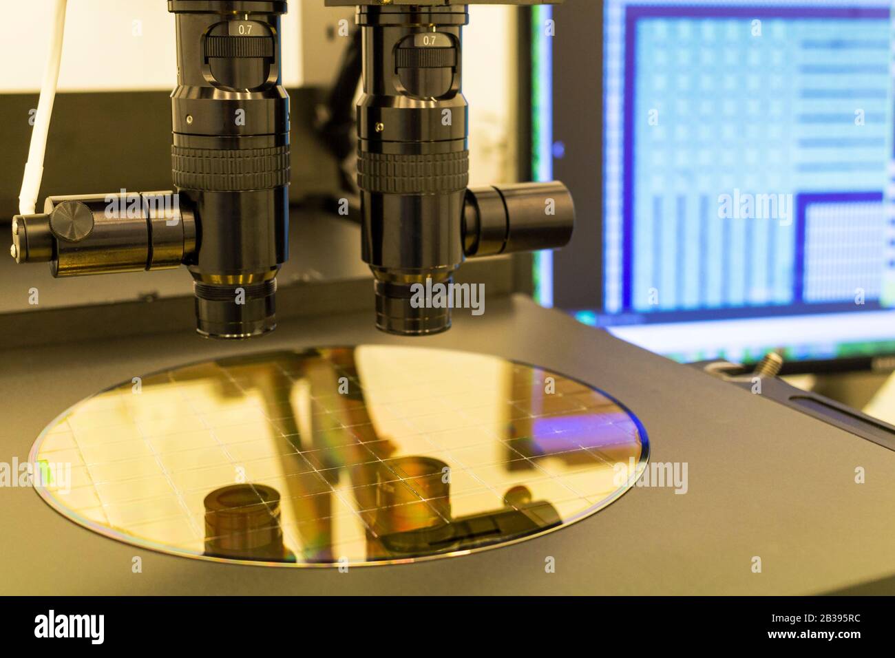 Silicon wafer on machine process examining in microscope Stock Photo ...