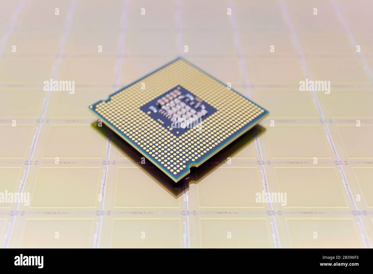 Photo of a Computer Chip CPU put on silicon wafer with microchip Stock ...