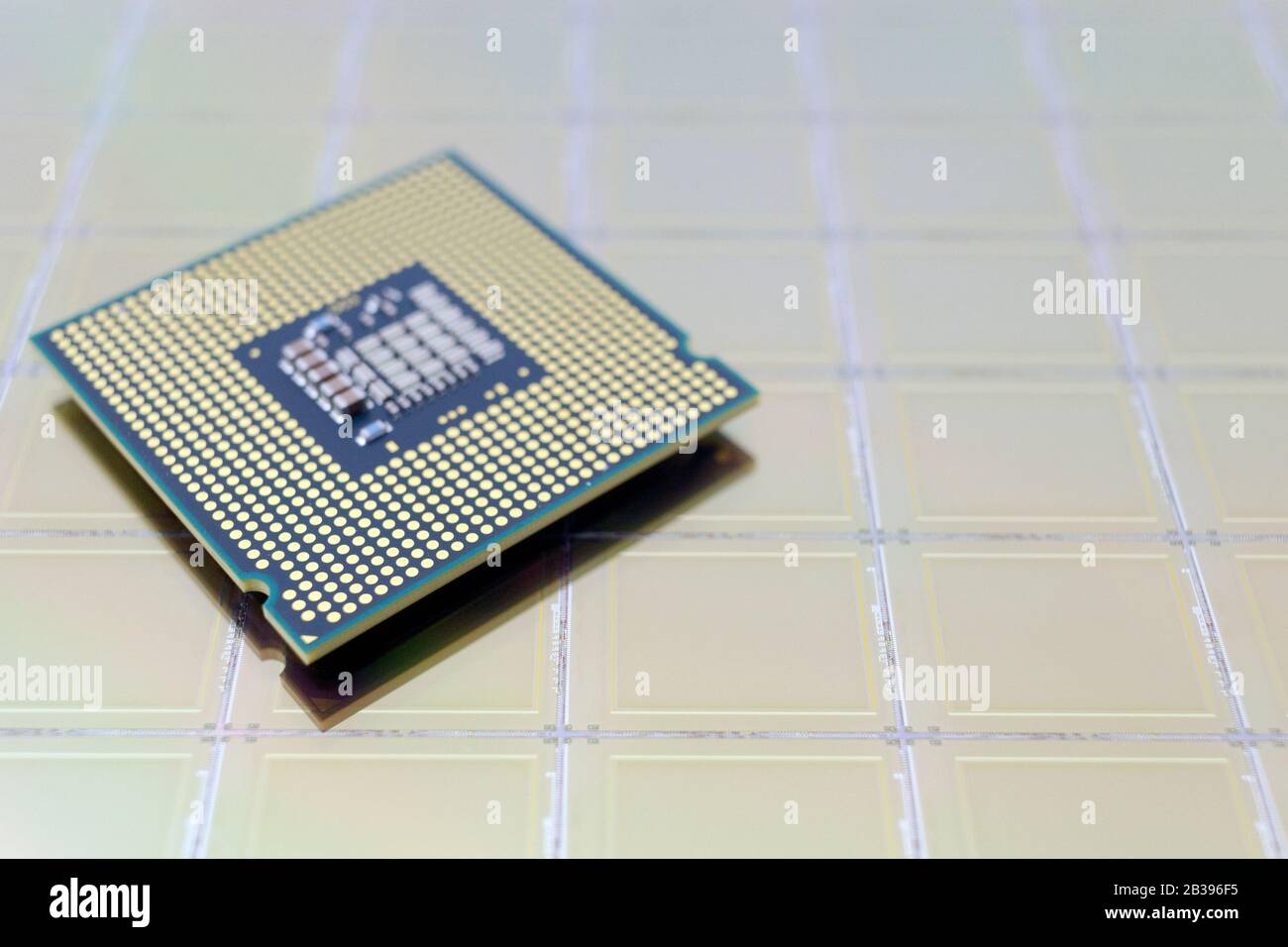 Photo of a Computer Chip CPU put on silicon wafer with microchip Stock ...