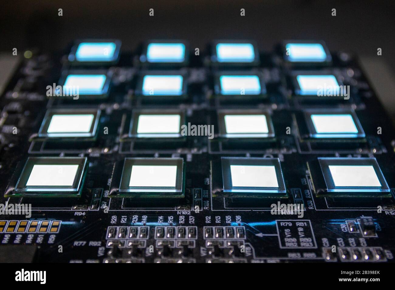 The process of checking several oled displays of white color on the ...
