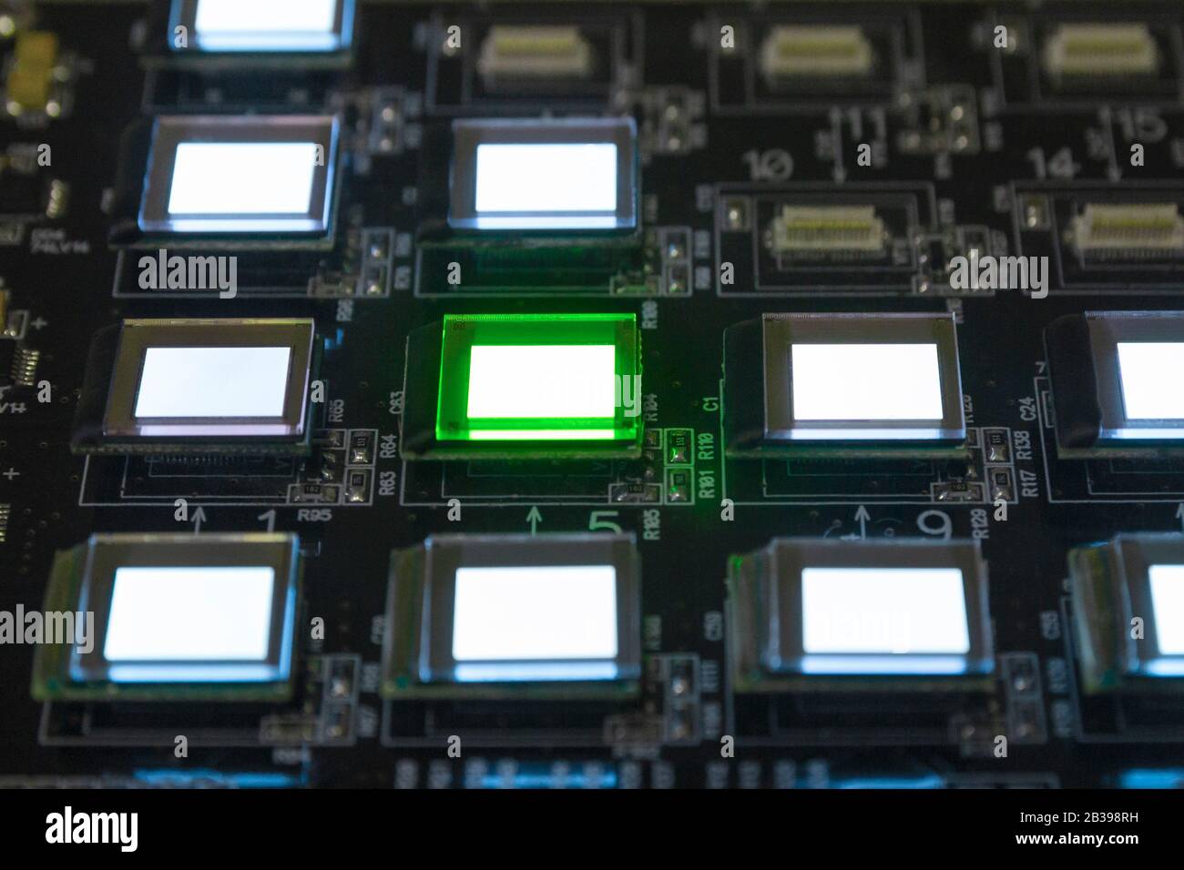 The process of checking several oled displays on the test station ...
