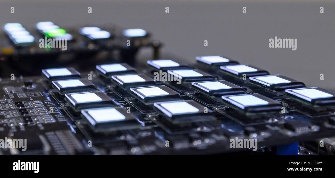 The process of checking several oled displays of white color on the ...