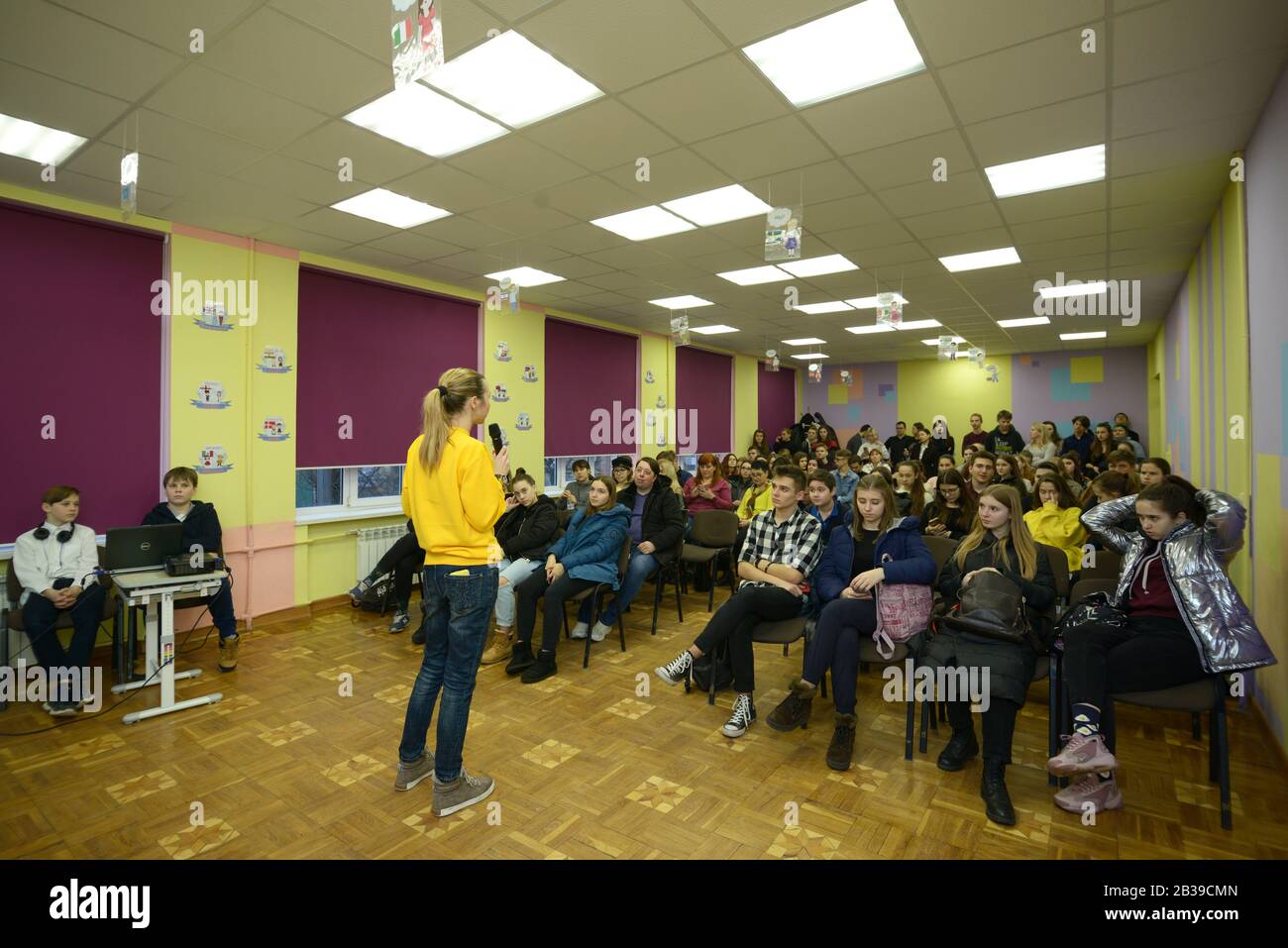 Children school assembly sitting hi-res stock photography and images ...