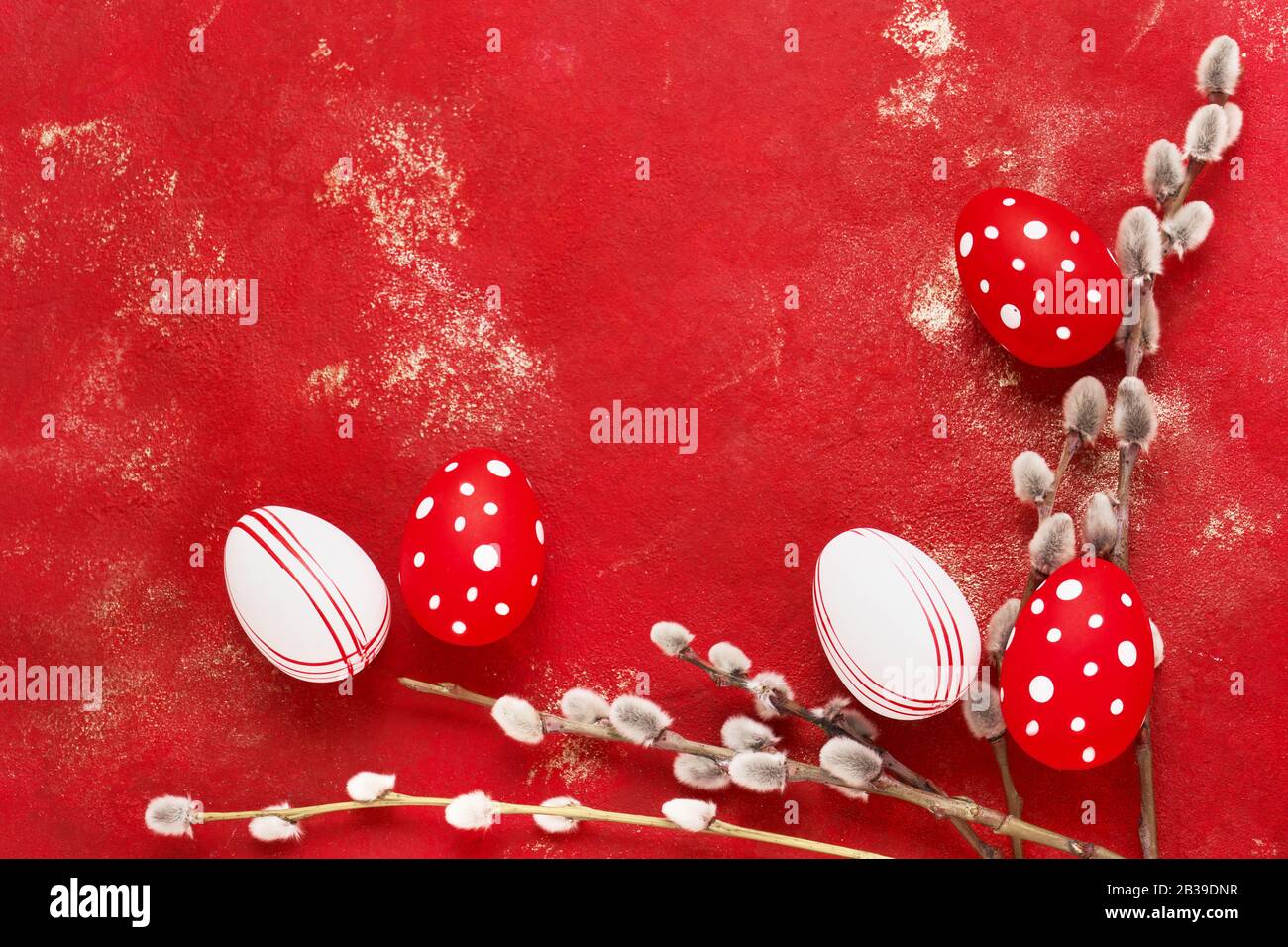 Red Easter background. Red and white Easter eggs and pussy willow ...