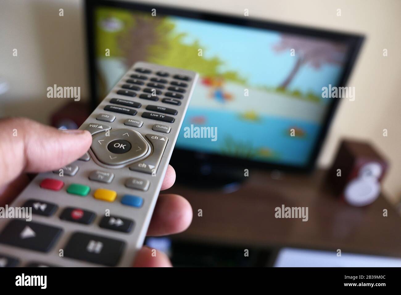 Hand tv remote hi-res stock photography and images - Alamy