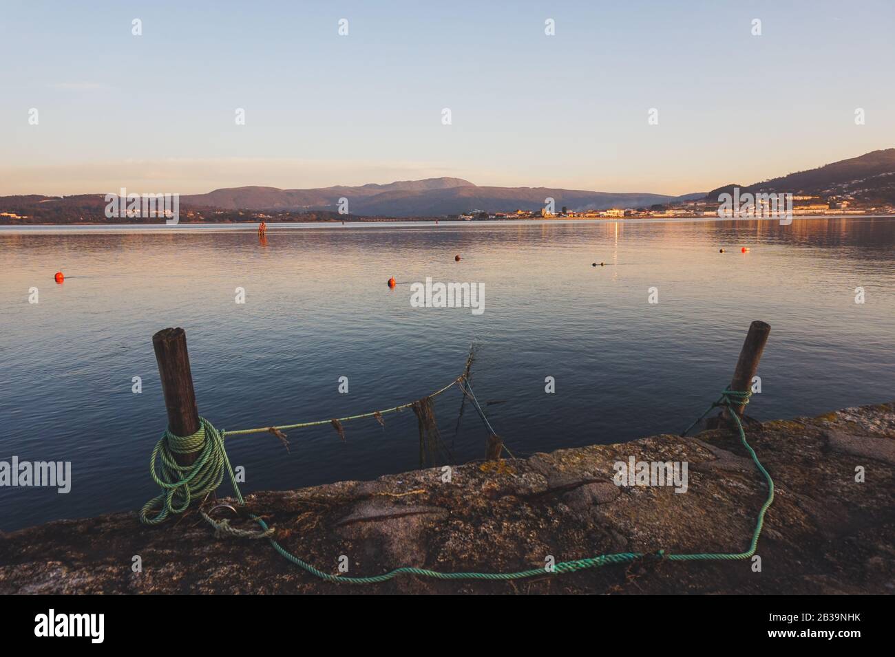 Old pier at sunset in a summer day Stock Photo - Alamy