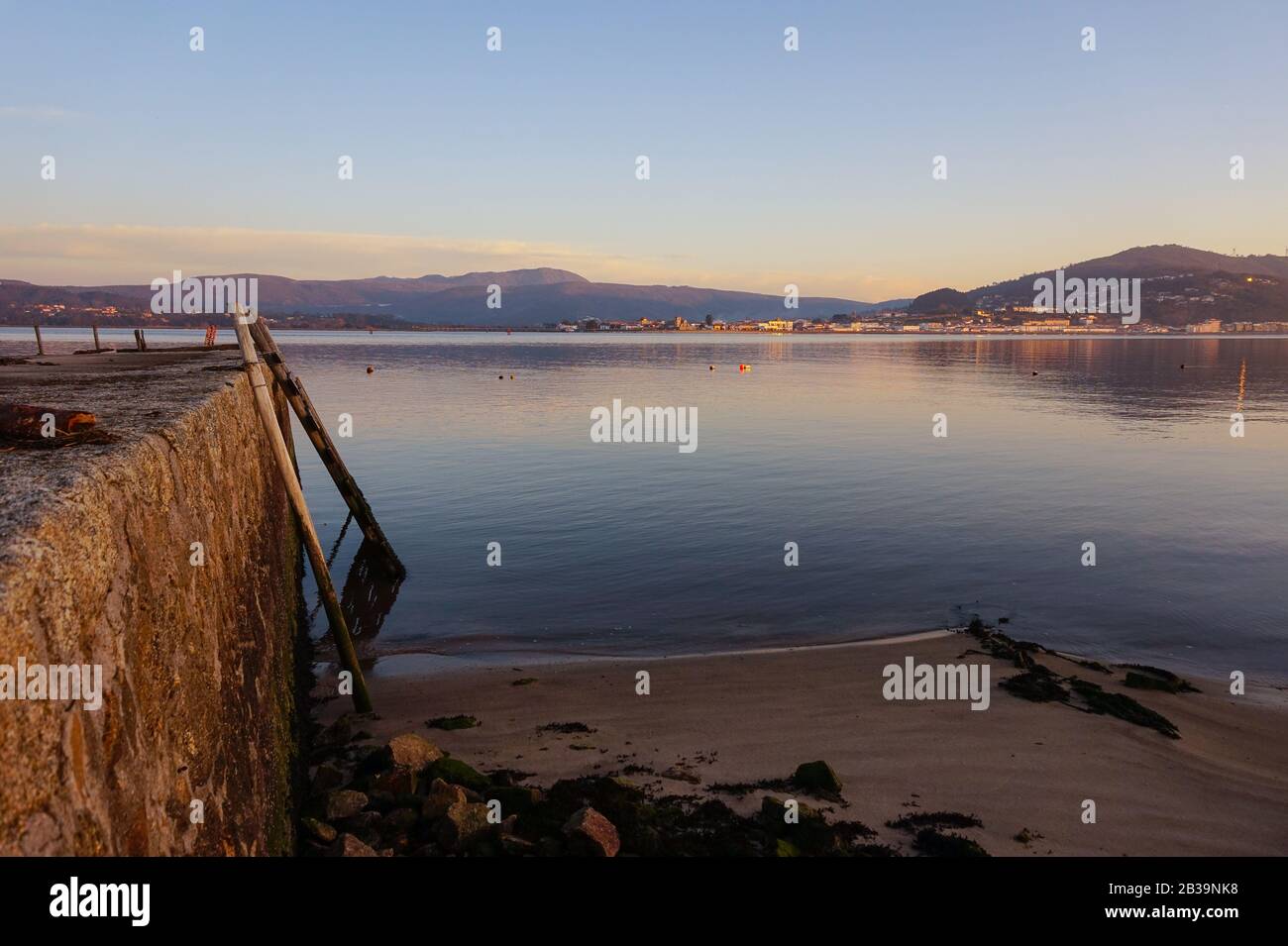 Old pier at sunset in a summer day Stock Photo - Alamy