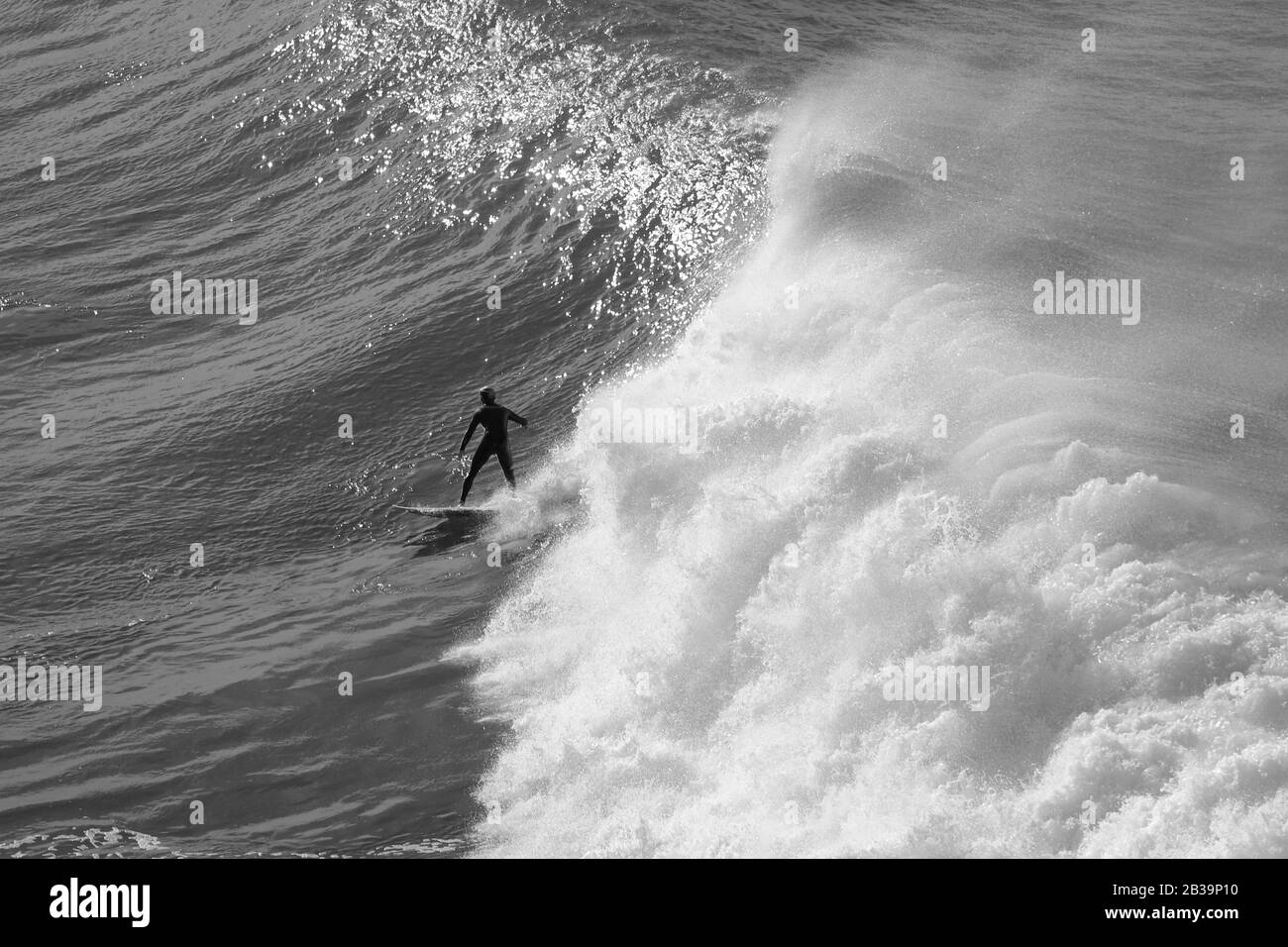 Wave surfer beach Black and White Stock Photos & Images - Alamy