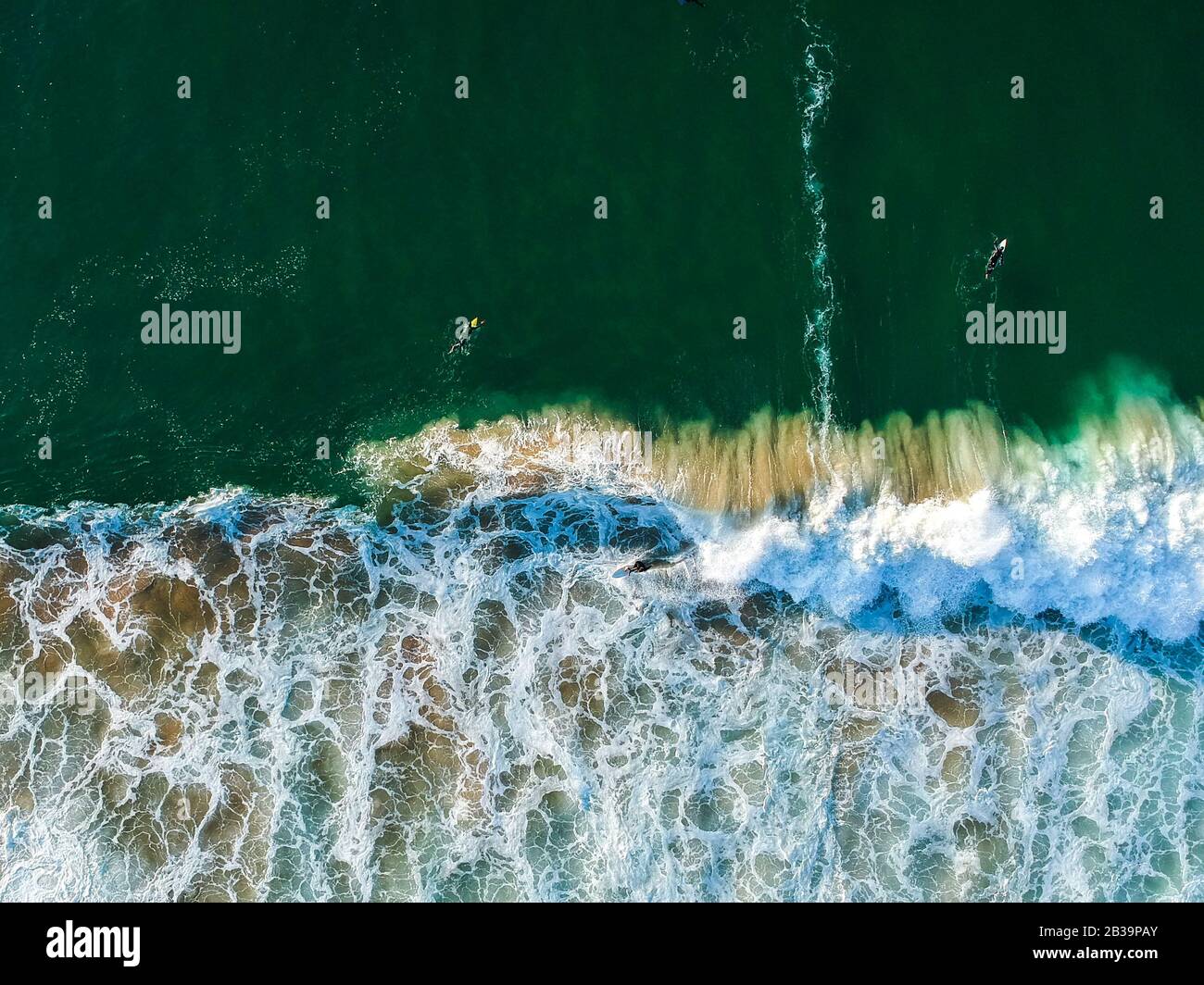 Beach shot with deep blue sea and golden sand hi-res stock photography ...