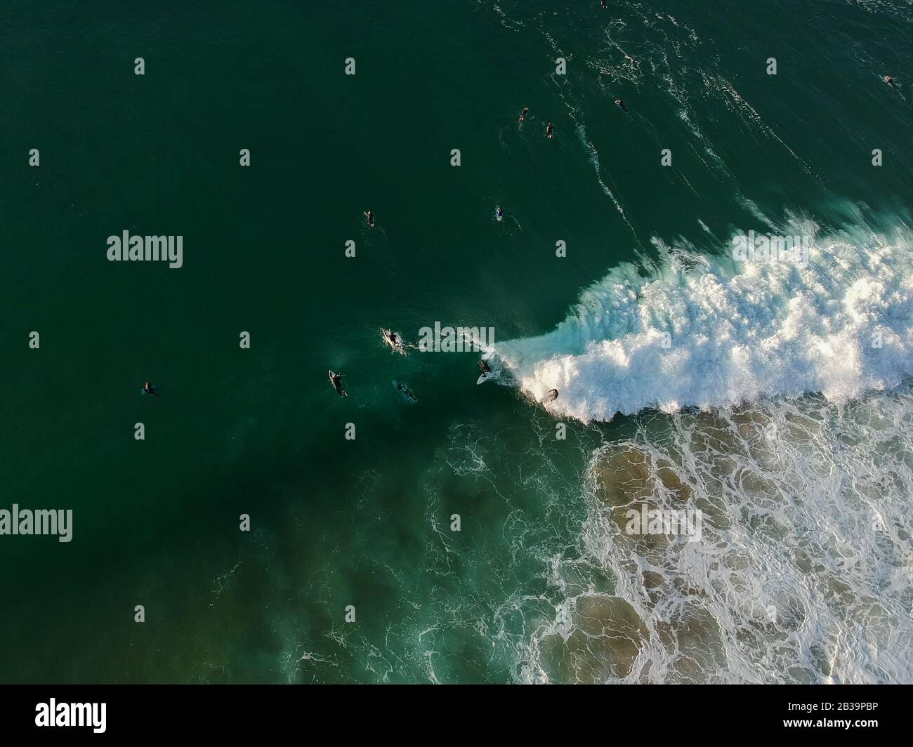 Beach shot with deep blue sea and golden sand hi-res stock photography ...
