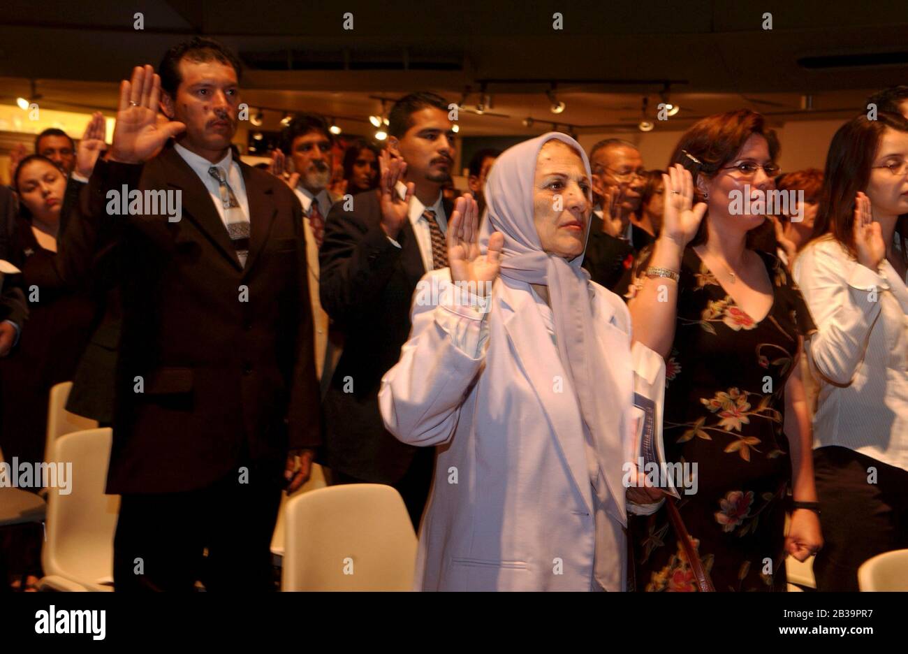 Crowd swearing allegiance hi-res stock photography and images - Alamy
