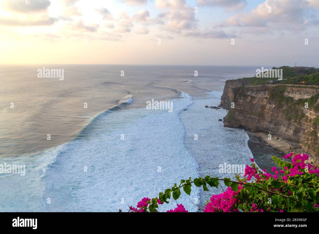 Pura Luhur Uluwatu temple. Amazing landscape - cliff with blue sky and ...