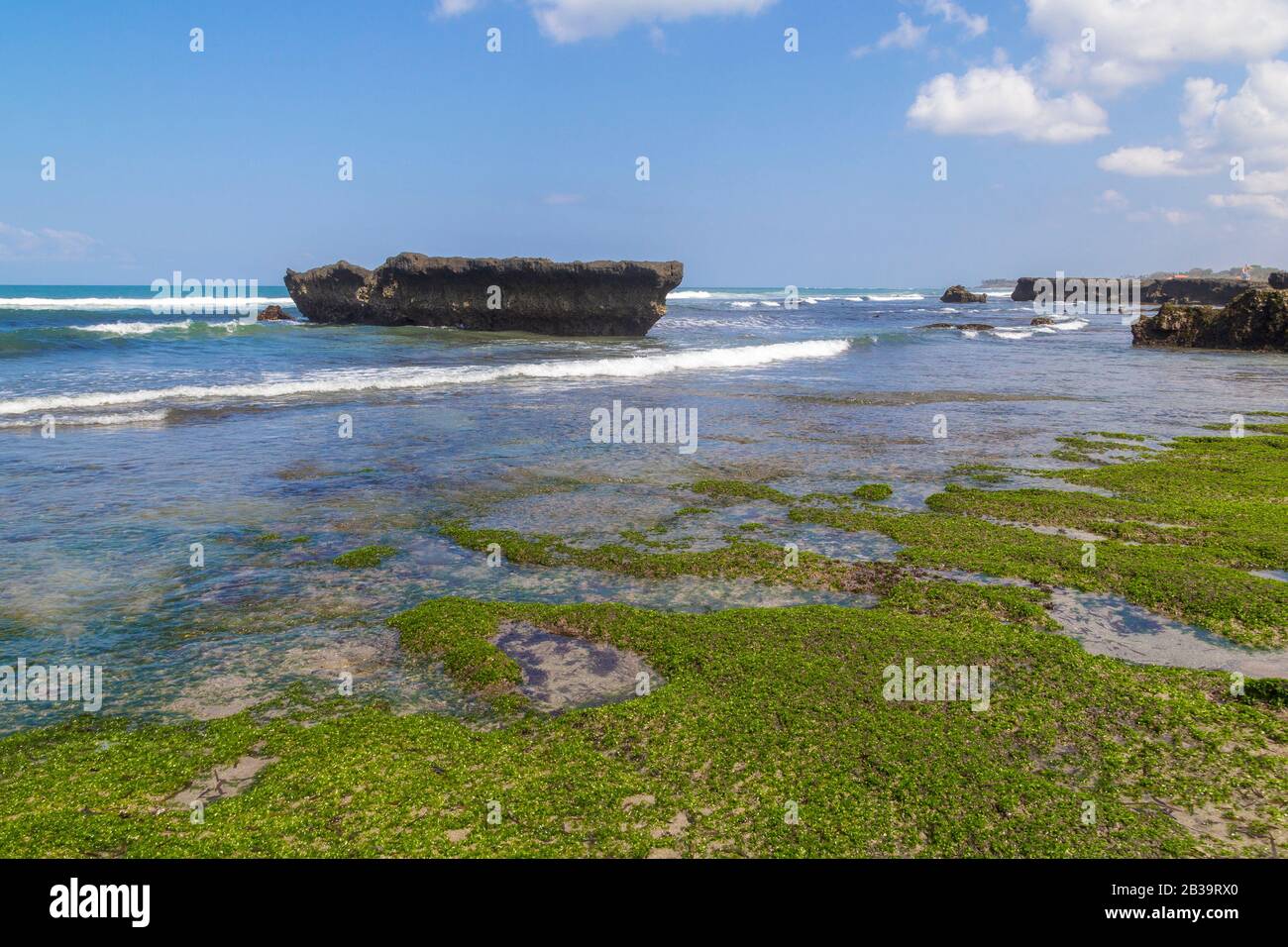 Stunning natural rock pools at Echo beach in sunny day in Canggu, Bali ...