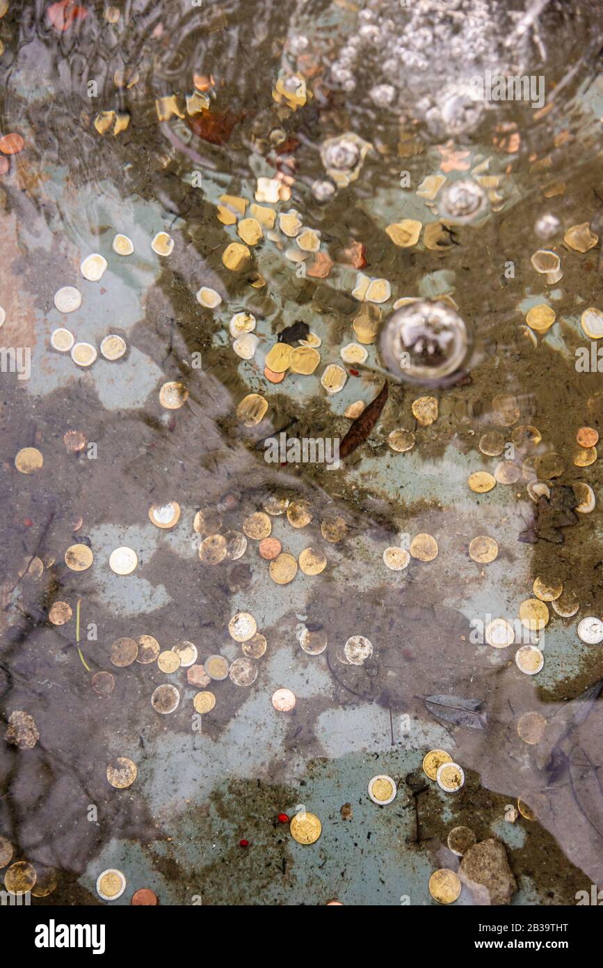 Throw coins well hi-res stock photography and images - Alamy