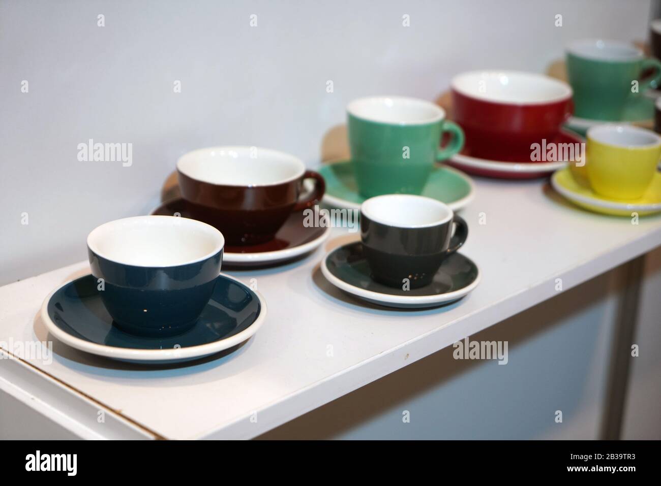 Cups of coffee lined up hi-res stock photography and images - Alamy