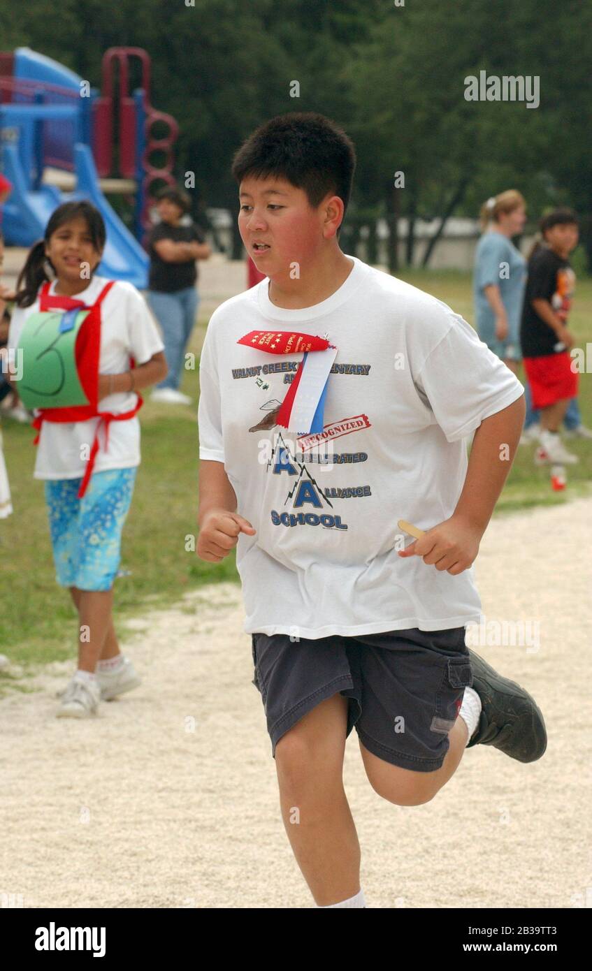 Austin Texas USA, circa 2004: Fourth-grade boys compete in mile run ...