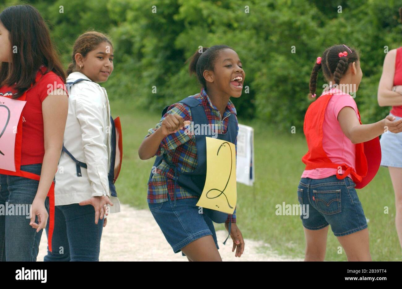 Austin Texas USA, circa 2004: Fourth grade relay team members wait for ...