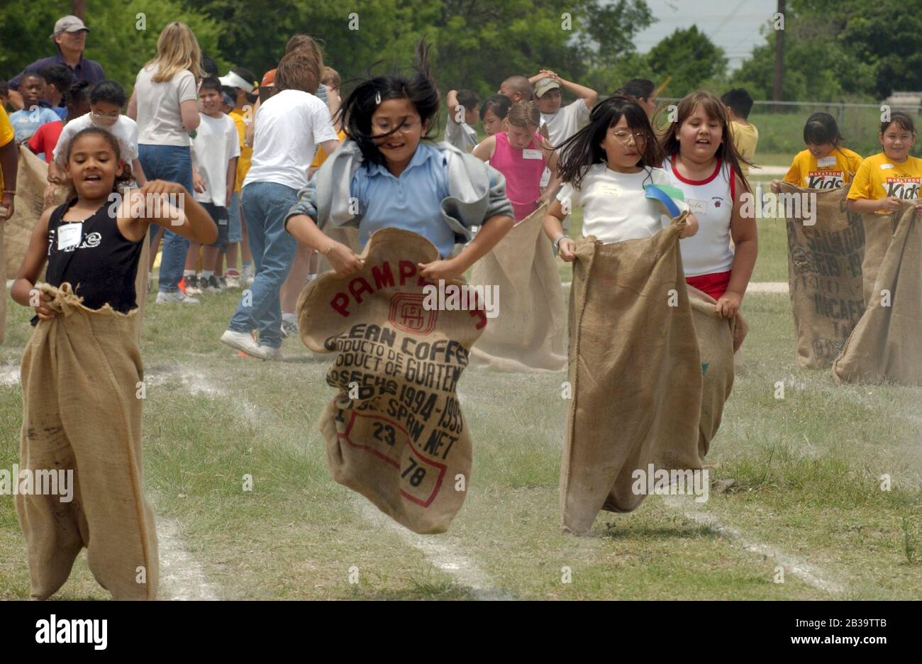 Children in sack race school hi-res stock photography and images - Alamy
