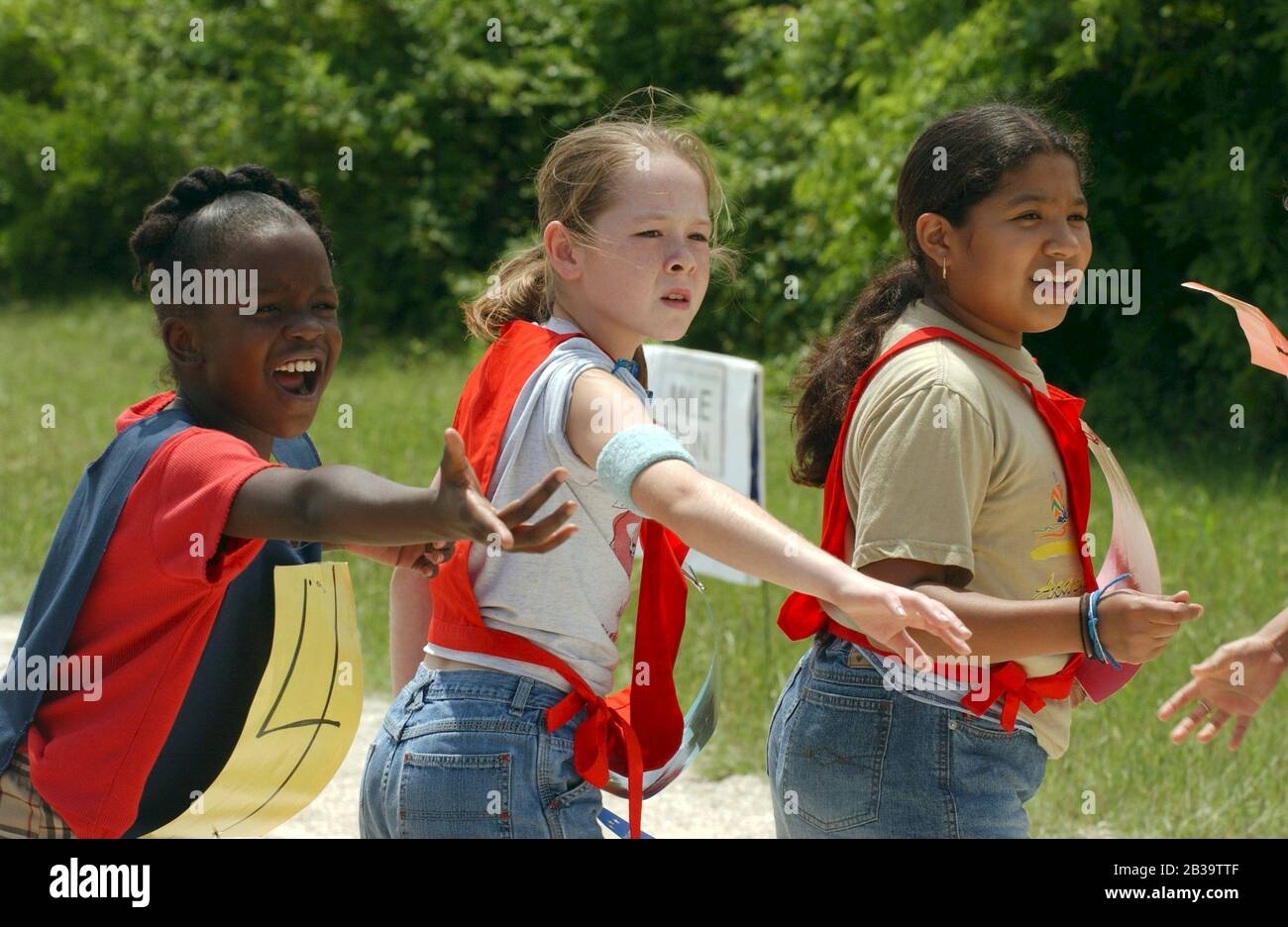 Austin Texas USA, circa 2004: Fourth grade relay team members wait for ...