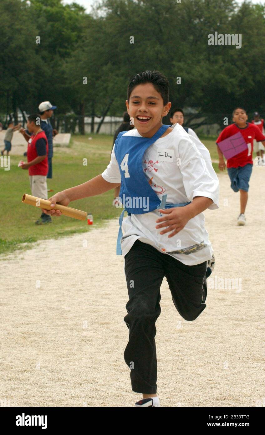 Austin Texas USA, circa 2004: Fourth-grade boys compete in relay run ...