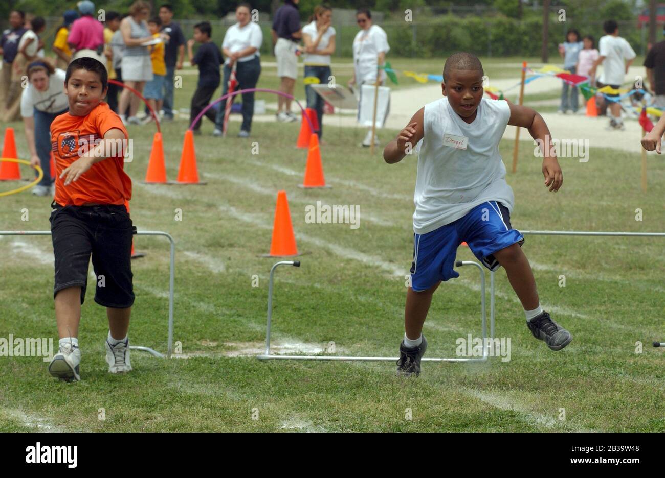 Children running field multiethnic hi-res stock photography and images ...