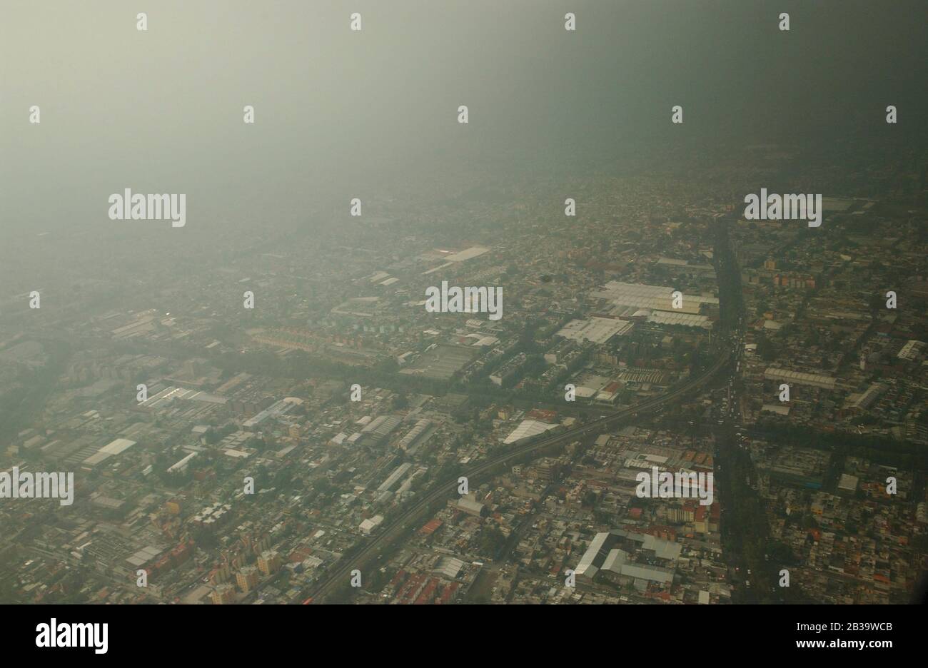 Mexico City DF, Mexico, June 2004: Aerial view of thick smog hanging ...