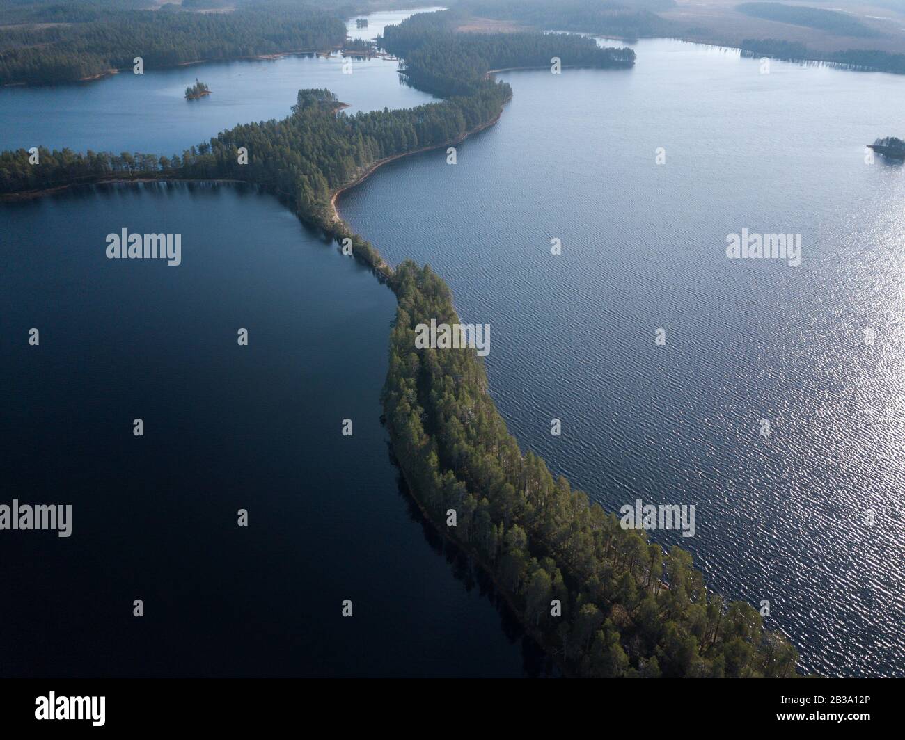 Aerial landscape of ridge cape in middle of lake Stock Photo - Alamy