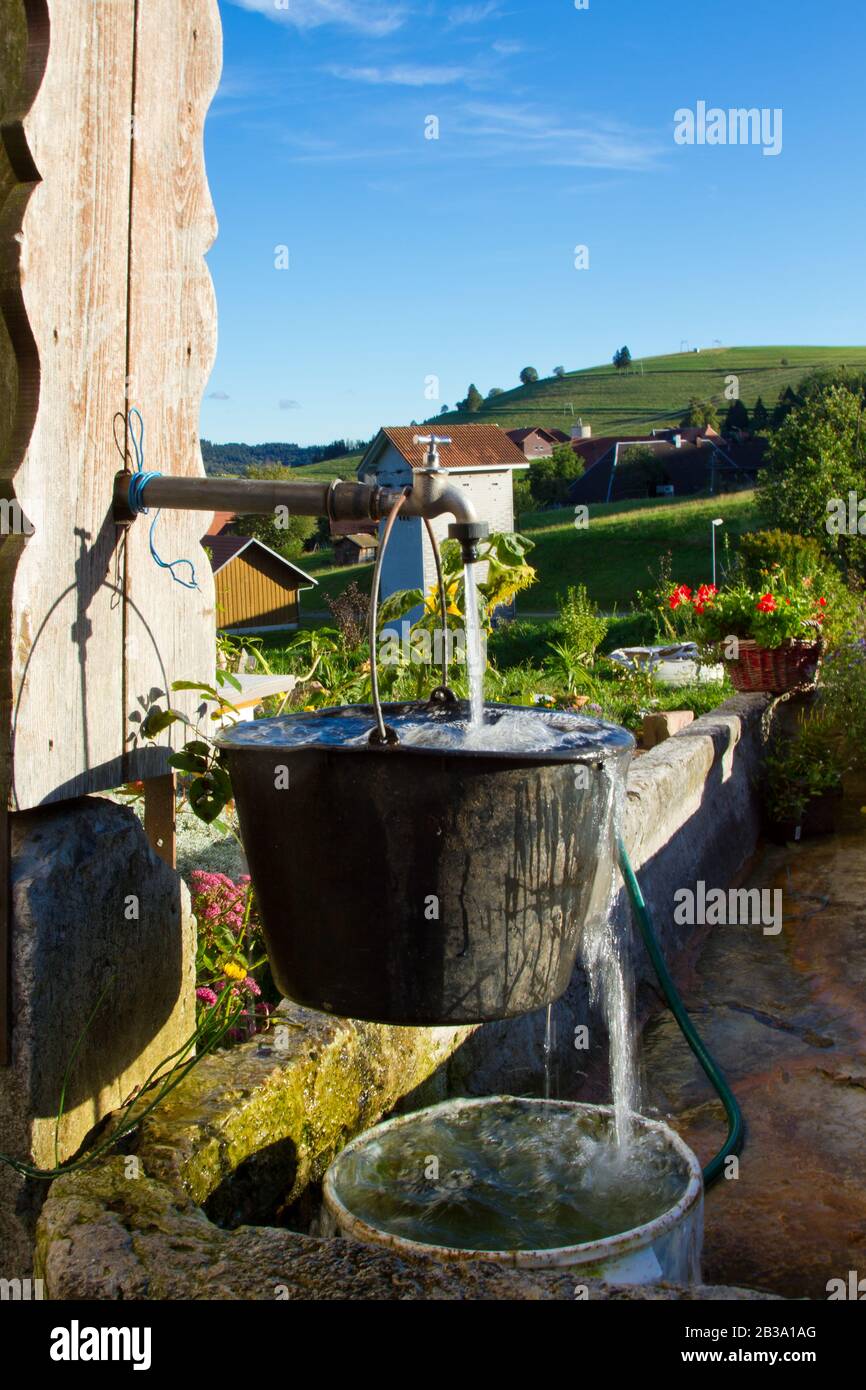 old fountain with bucket Stock Photo - Alamy