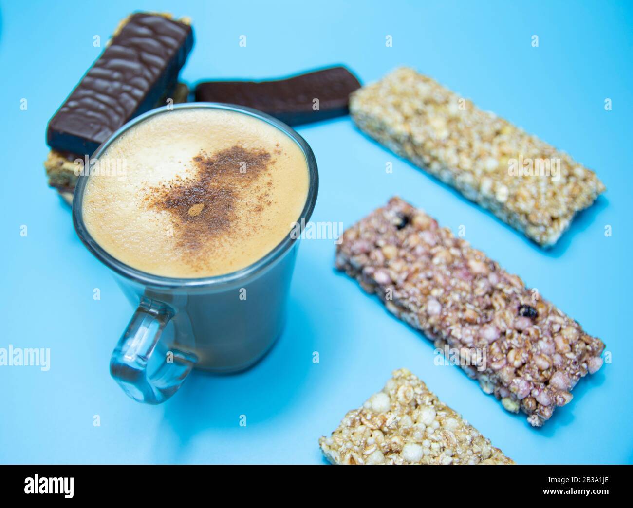 healthy nutrition protein bars on blue background Stock Photo - Alamy